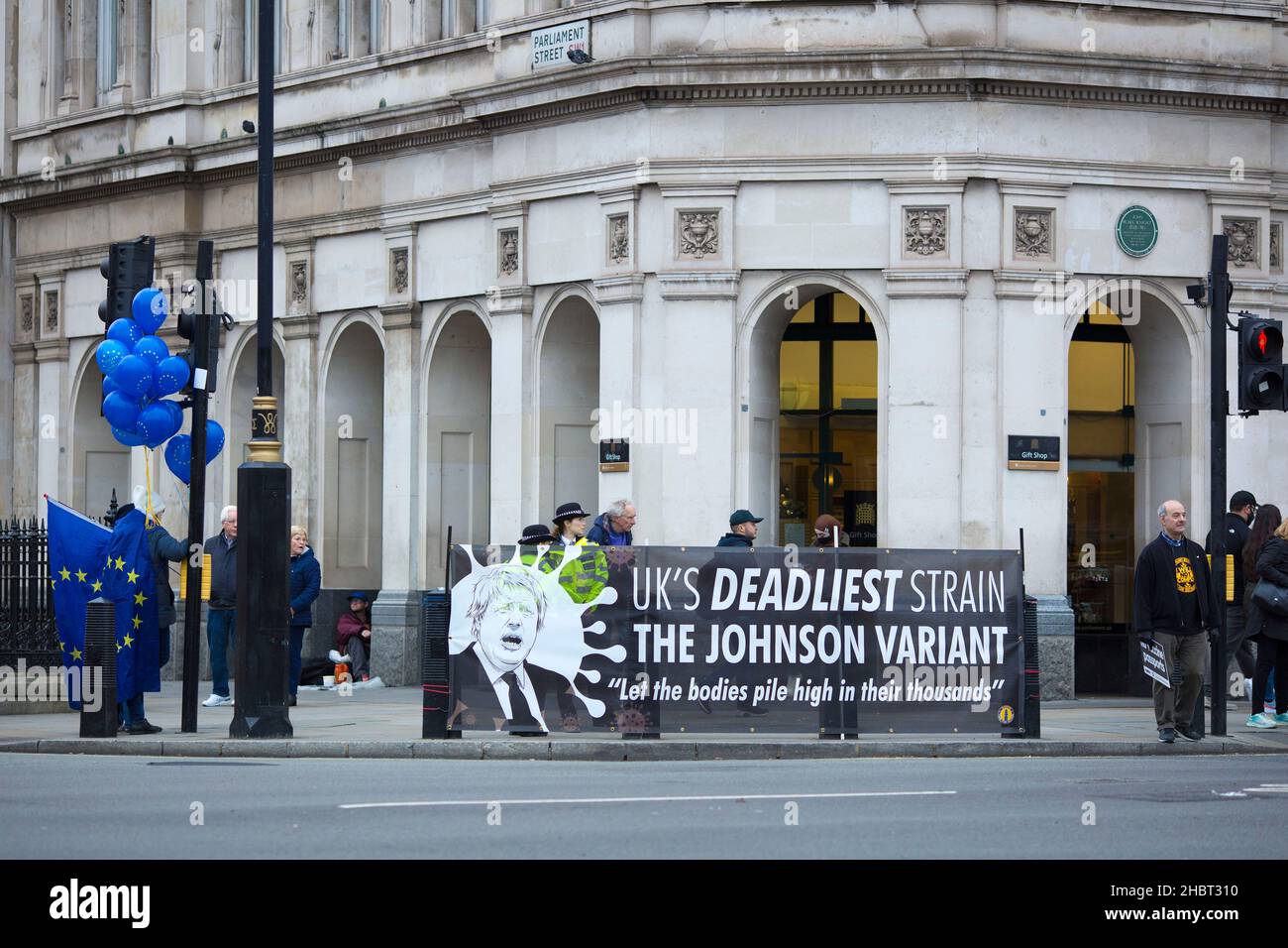 Banners against the current Conservative government are seen near the ...