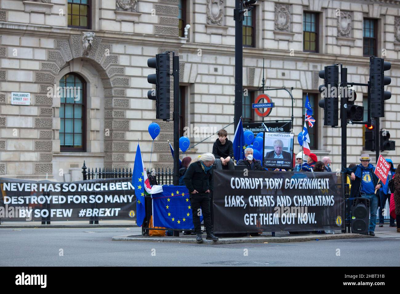 Banners against the current Conservative government are seen near the ...