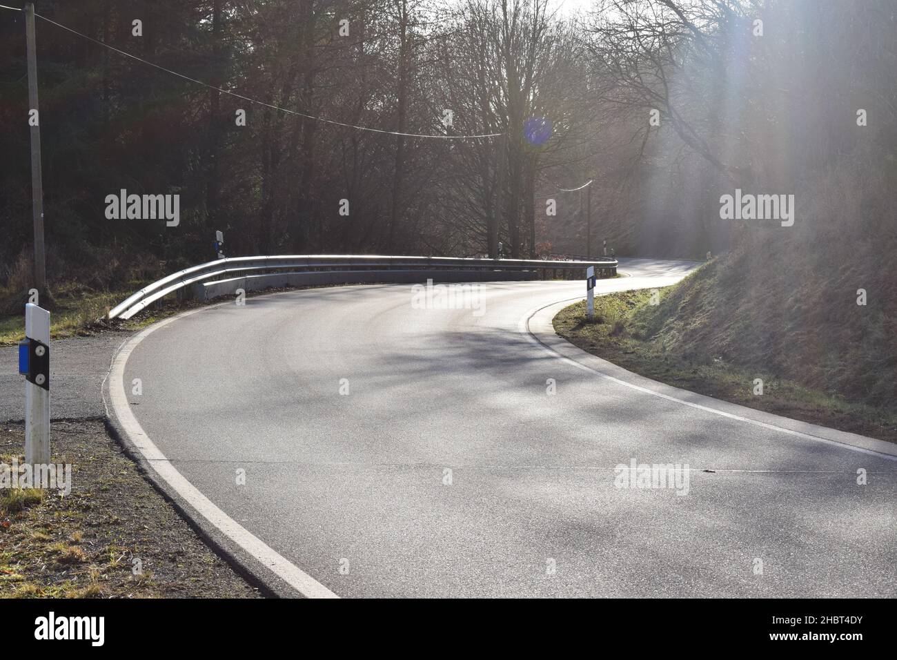 country road curve in early winter Stock Photo - Alamy