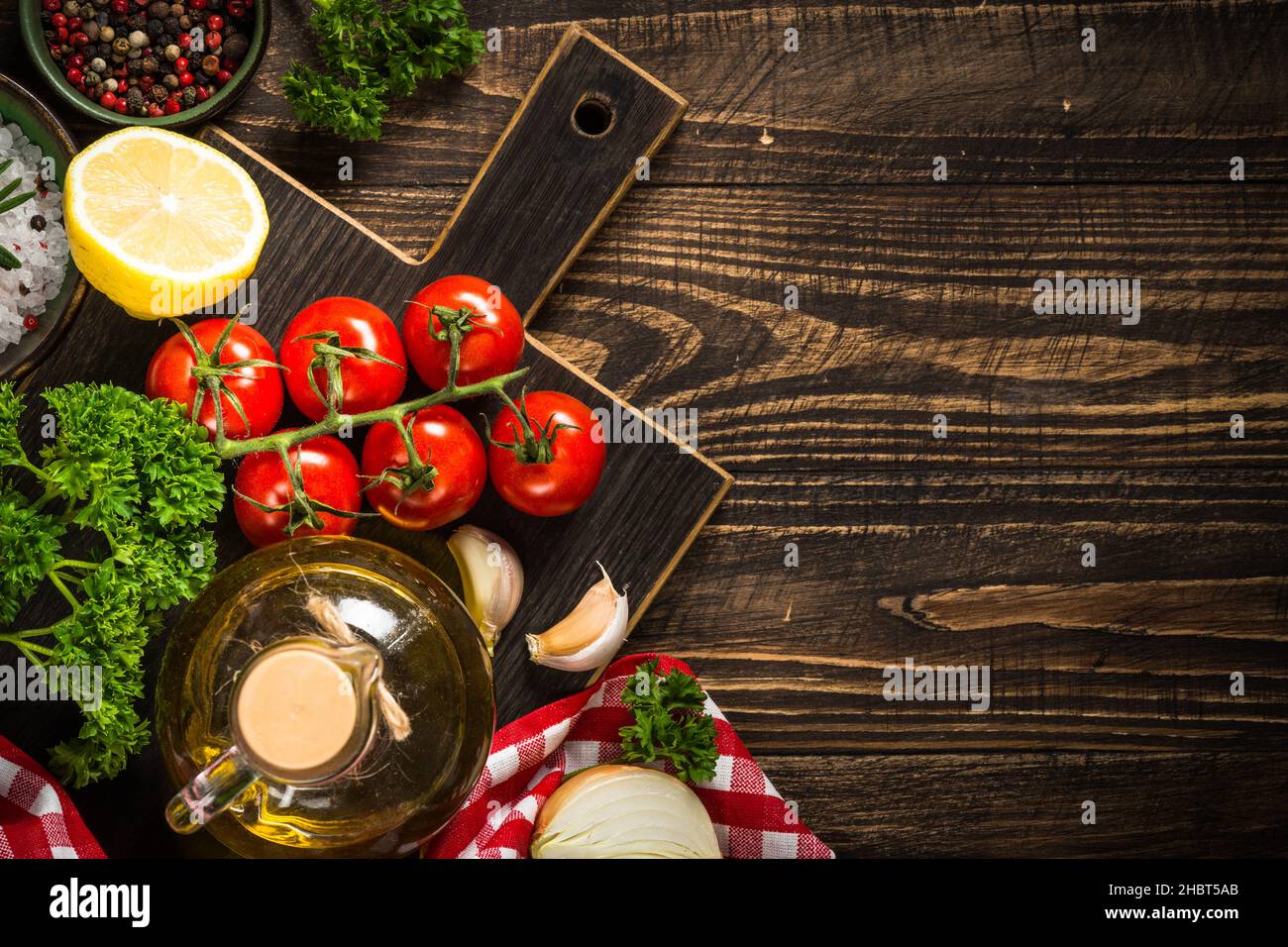 Food cooking background on wooden kitchen table Stock Photo - Alamy