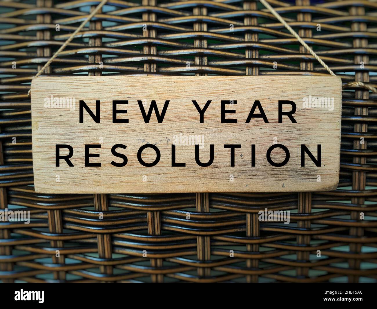 New year resolution text on wooden signage. Marking the end of the year ...