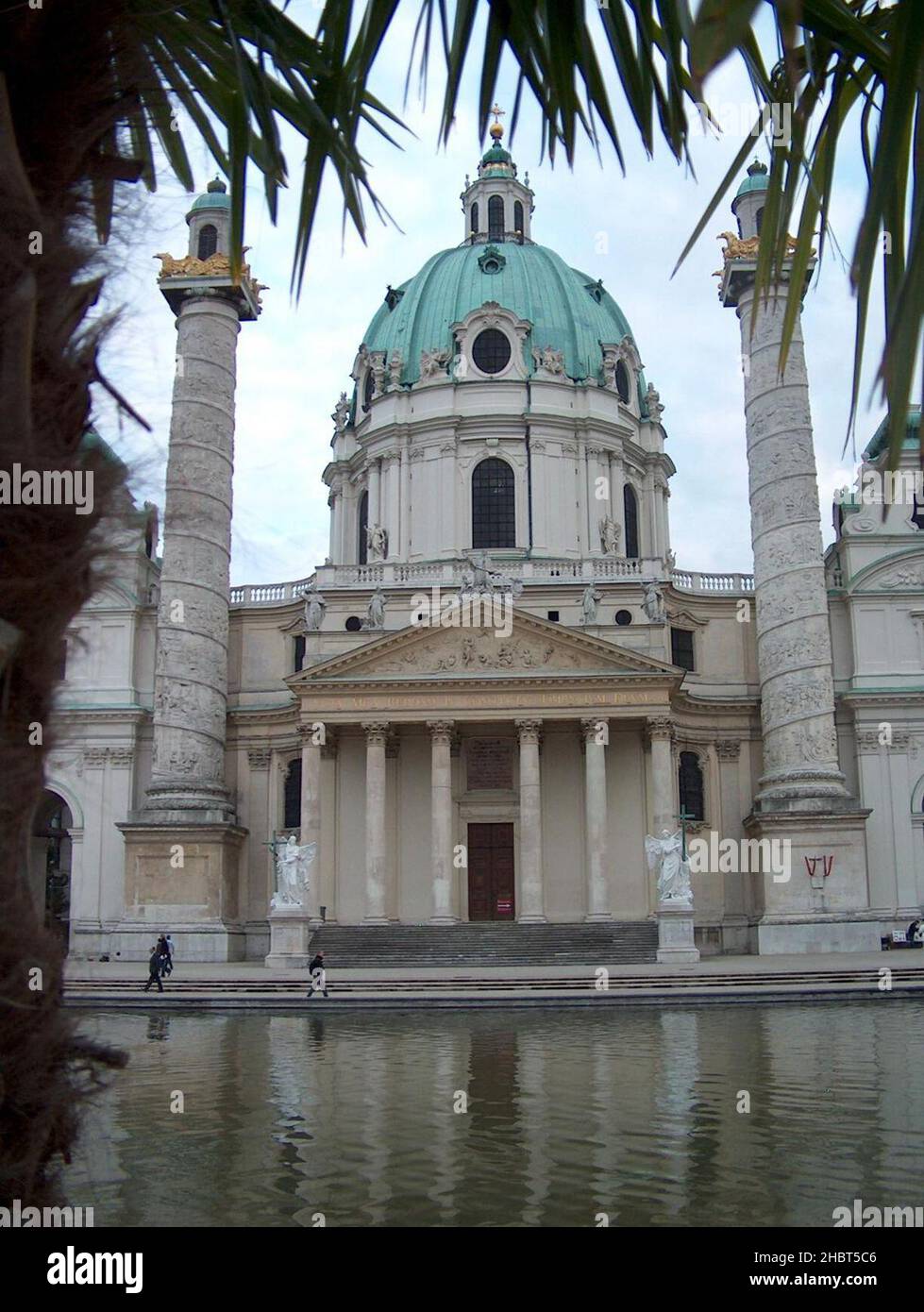 The Karlskirche (St. Charles Borromeo Church) in Vienna, is flanked by ...