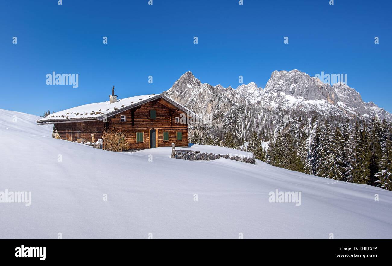 Alpine hut in an idyllic winter landscape, Salzburger Land, Austria ...