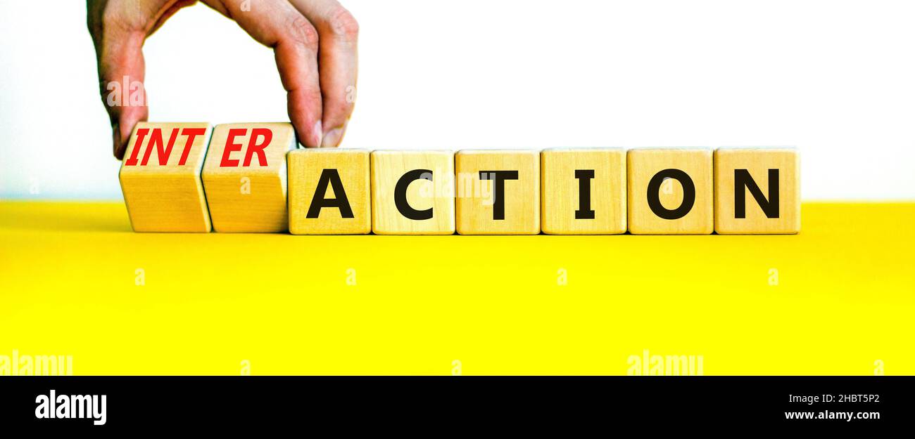 Action or interaction symbol. Businessman turns wooden cubes and ...