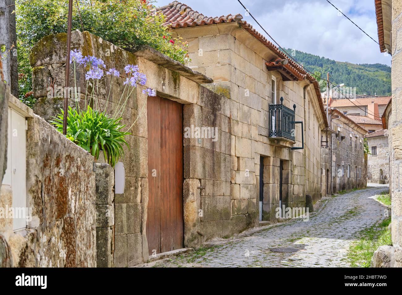 Traditional stone houses in the village of Limoes. Serra do Alvao, Tras ...