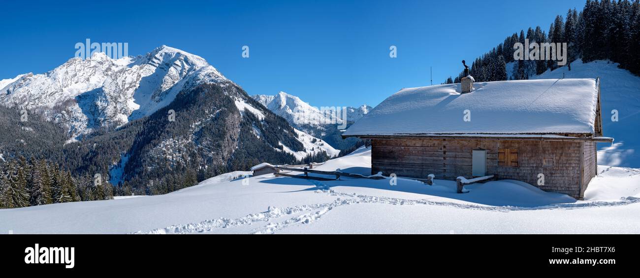 Traditional austrian alpine hut in an idyllic winter landscape ...