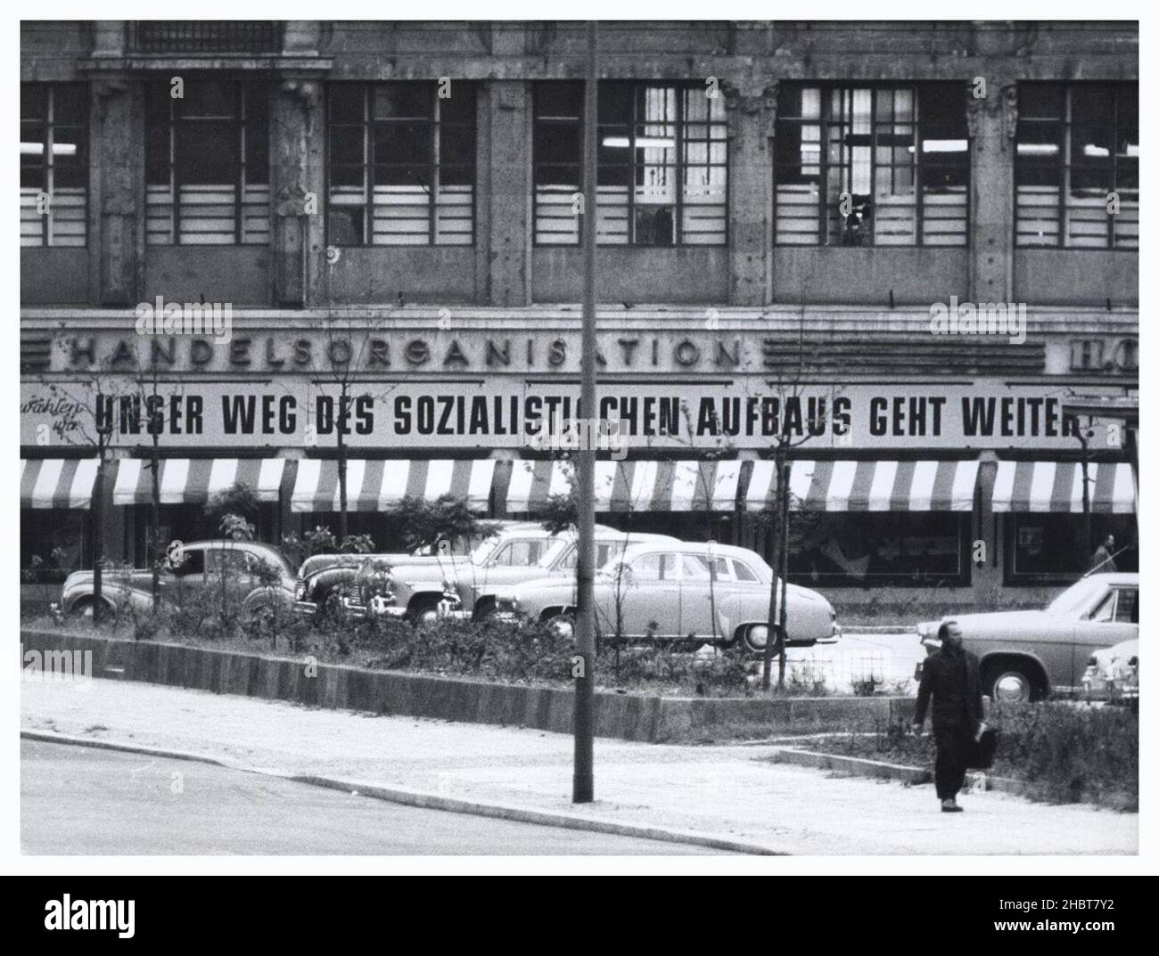 Sept.15, 1961. A propaganda sign in East Berlin proclaims: Building our ...