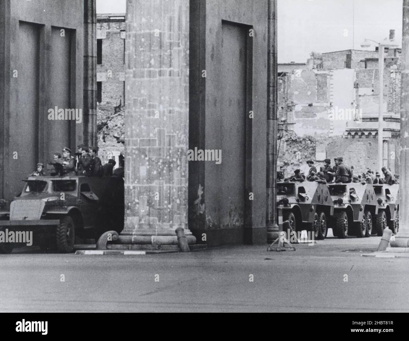 Late August 1961. East German armored cars line up behind the war ...