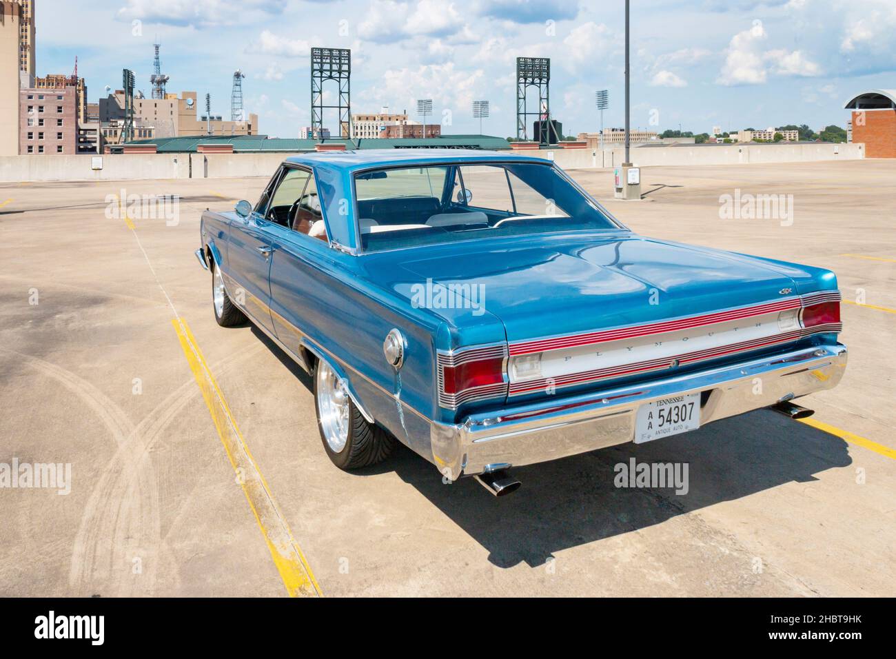blue vintage 1967 Plymouth GTX car parked on roof of multi storey car ...