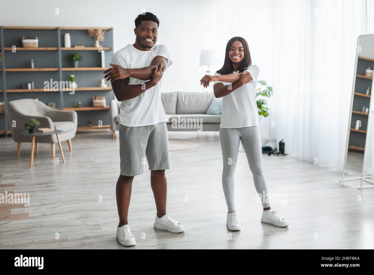 Man stretch exercise home hi-res stock photography and images - Alamy