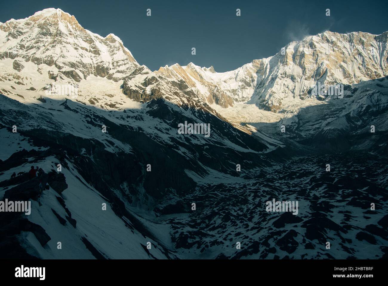 hiker on the trail in the Himalayan mountains. Trek around Annapurna ...