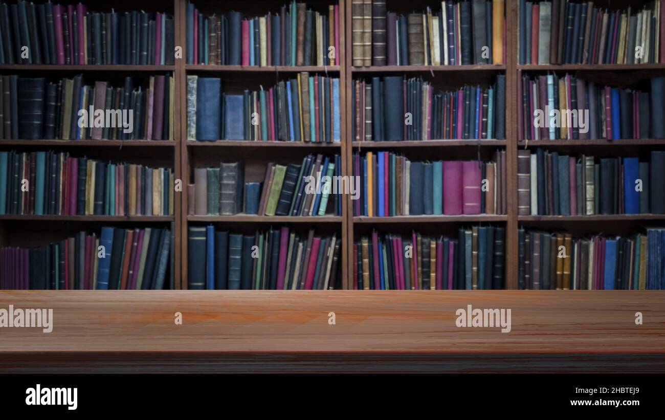 A wooden bookshelf with many thick and thin books with colorful covers ...