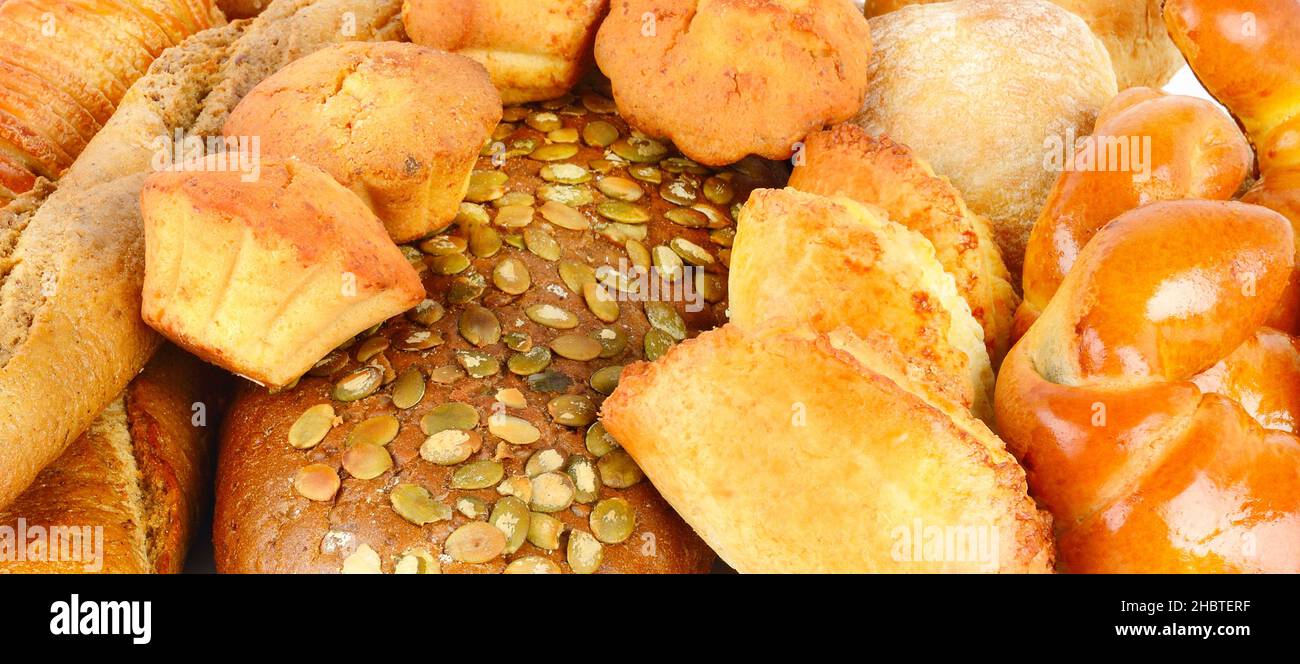 Assortment Bread and sweet pastries background. Wide photo Stock Photo ...
