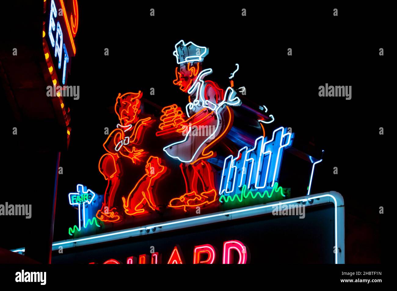 multicoloured illuminated neon signs of Howard Johnson restaurant and ...