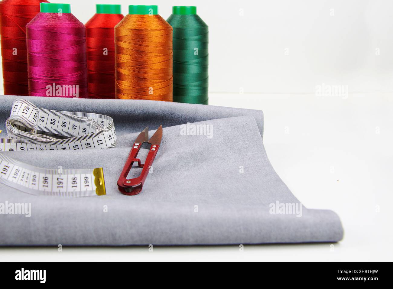 Pieces of cloth and thread. Tailoring, manufacture of upholstered ...