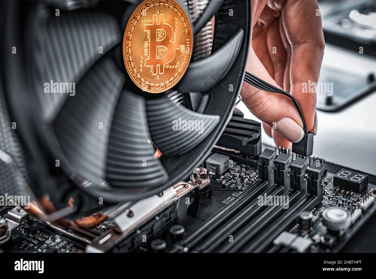 Cryptocurrency mining. Bitcoin coin on a graphic card, video card for ...