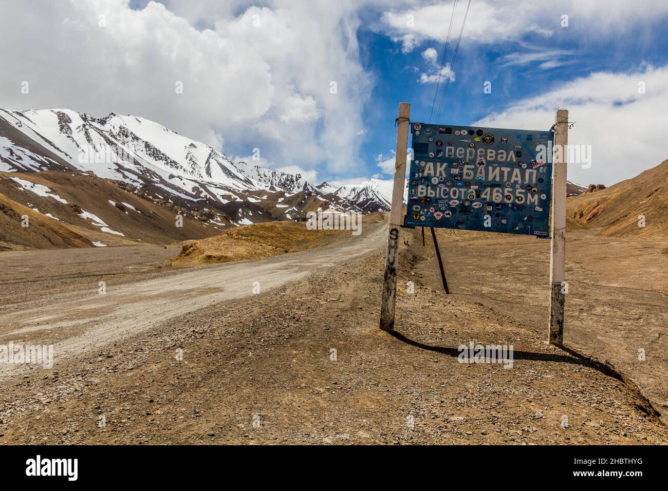 PAMIR HIGHWAY, TAJIKISTAN - MAY 27, 2018: Sign Ak Baital pass at Pamir ...
