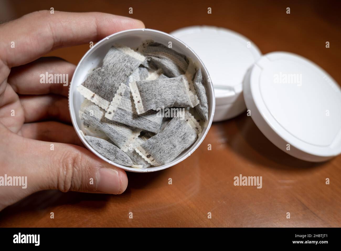 Snus, moist powder tobacco product widely consumed in Norway and Sweden ...