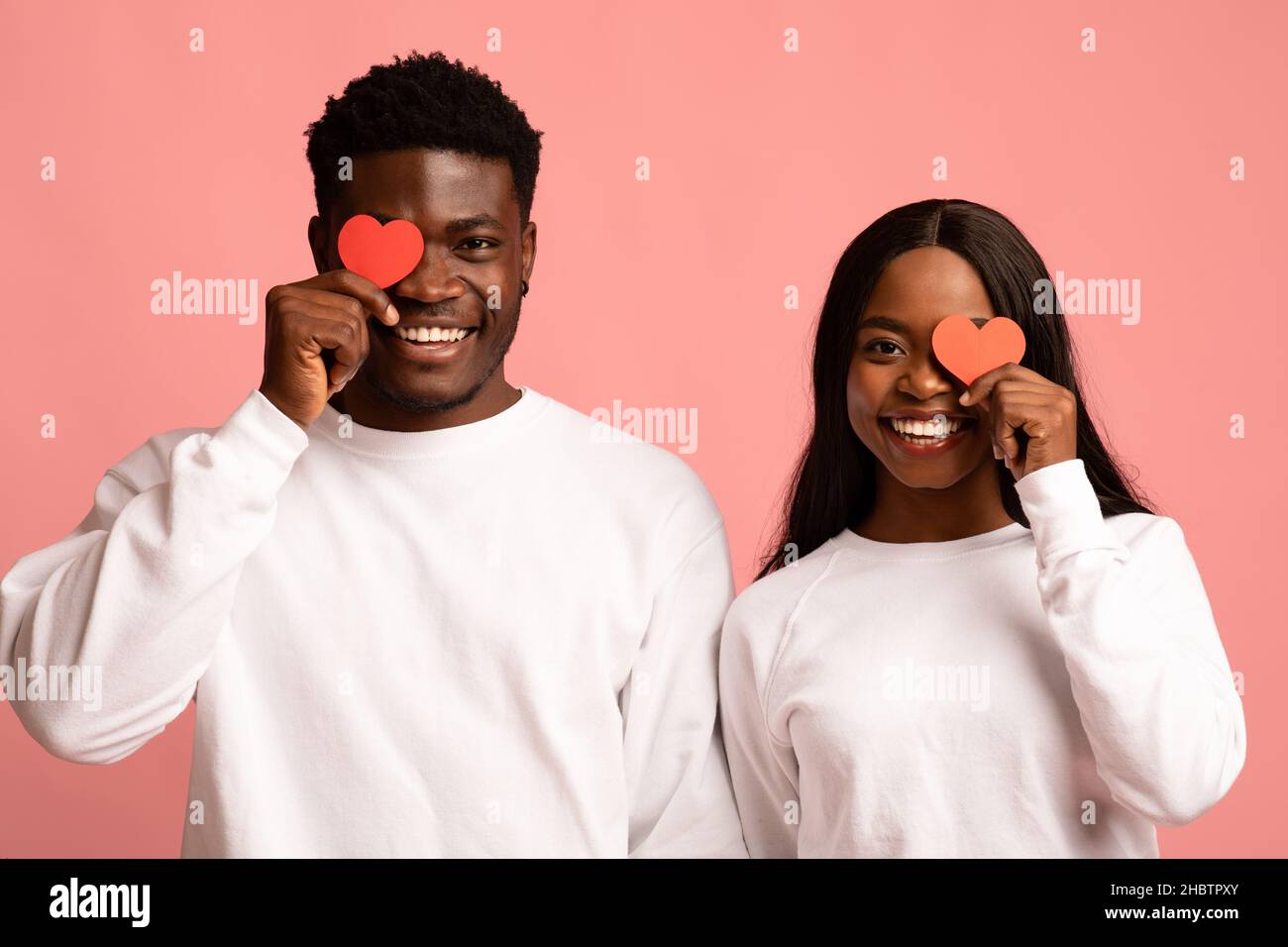 Cute african american couple celebrating St. Valentines Day together ...