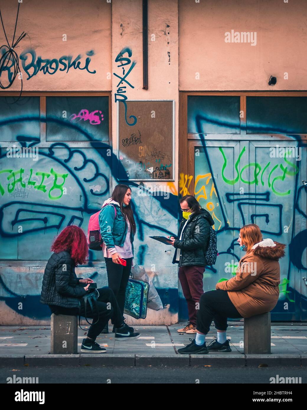 BUCHAREST, ROMANIA - Oct 19, 2021: A group of girls friends gossiping ...