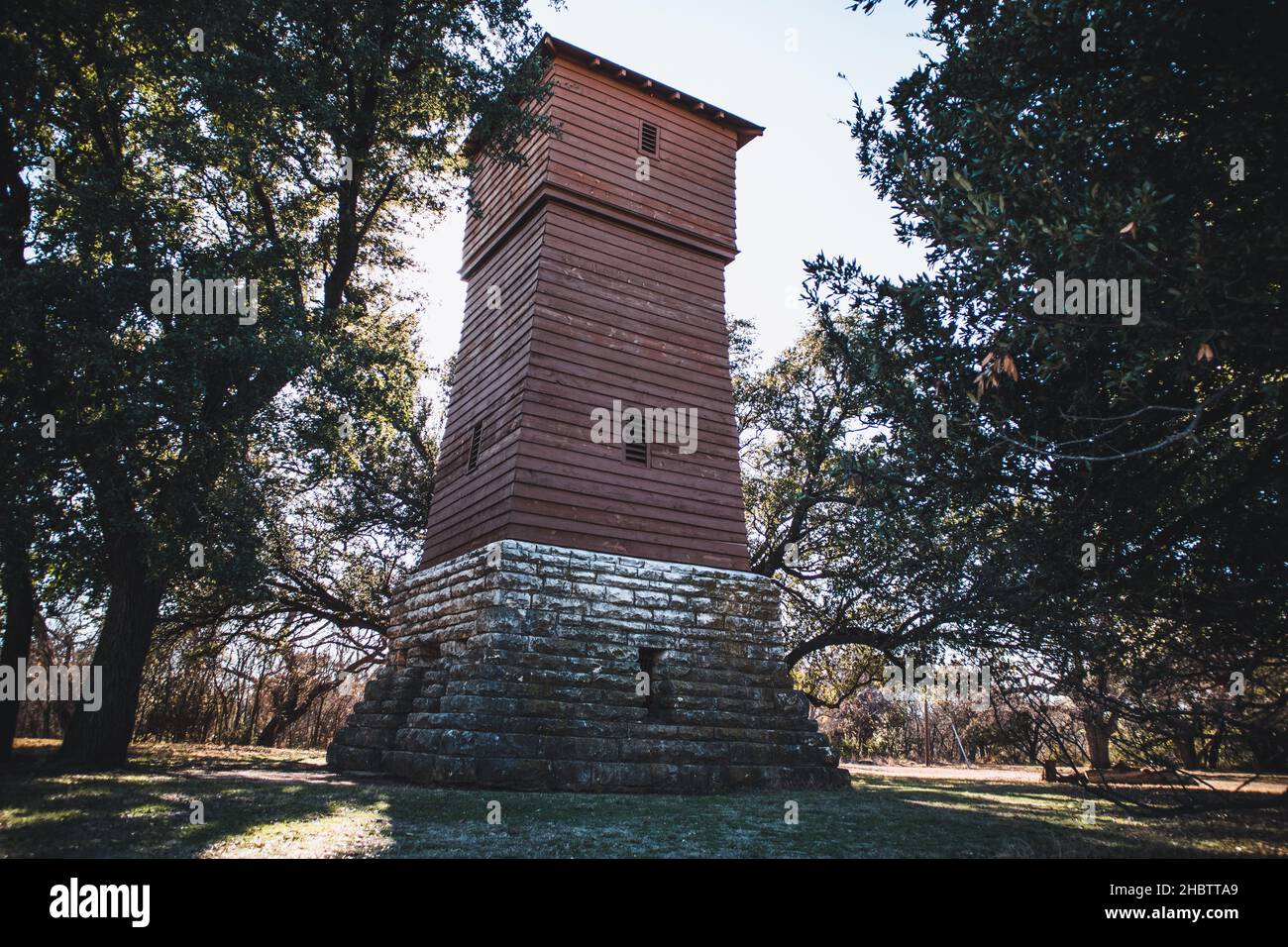 A historic water tower from the 1930s in a wooded area in the Abilene ...