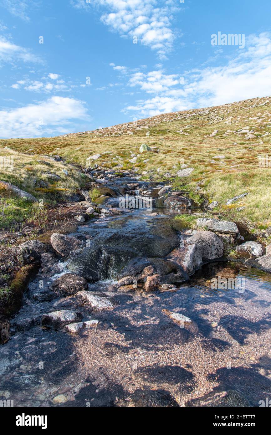 A stream running through the Cairngorms National Park in Scotland, UK ...