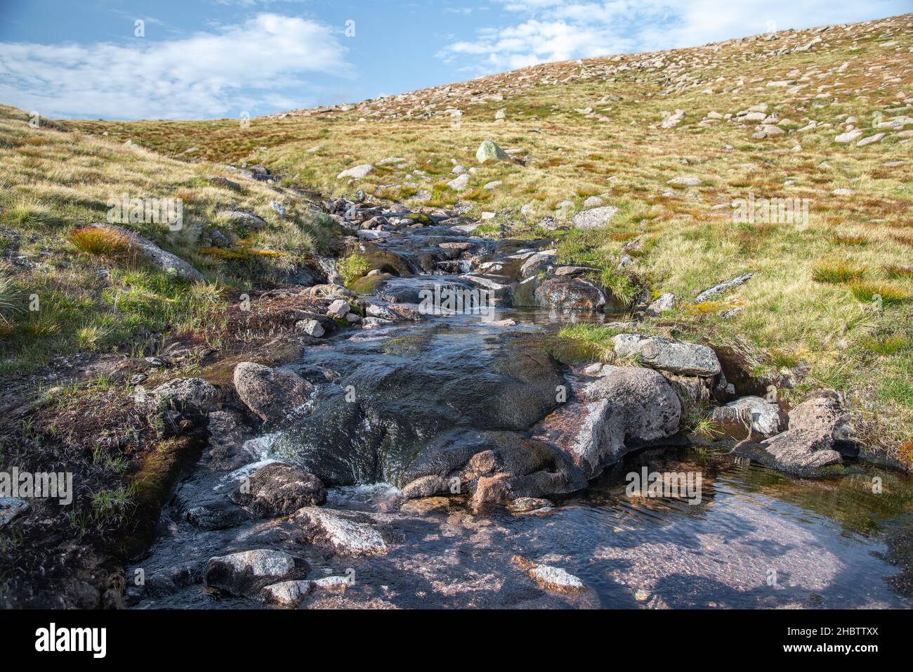 A stream running through the Cairngorms National Park in Scotland, UK ...