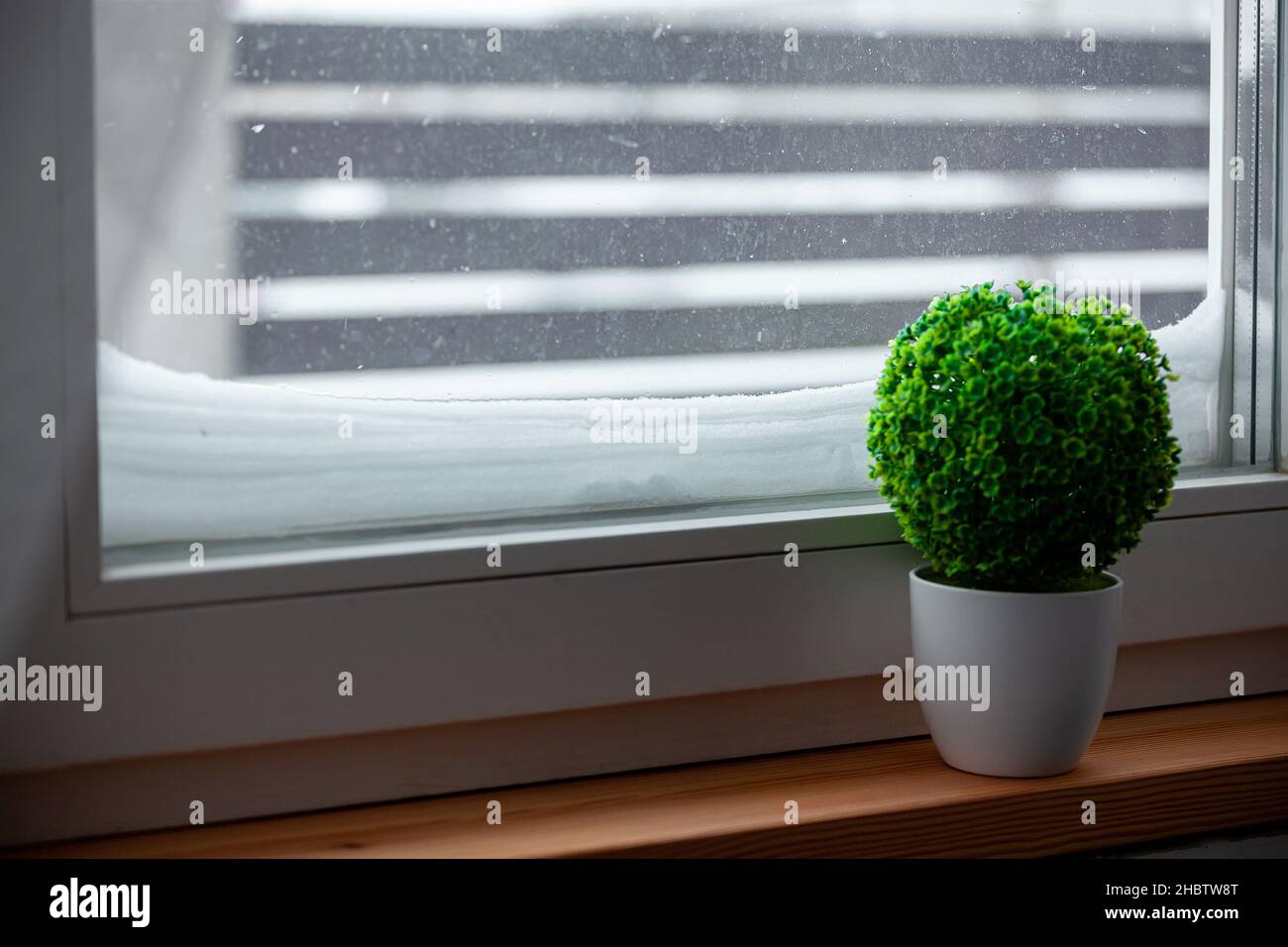Snow covered window in a house after heavy snowfall Stock Photo - Alamy