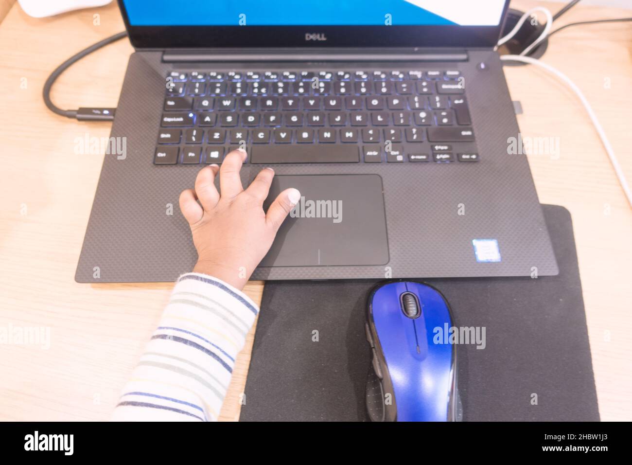 Child operating an unattended computer Stock Photo - Alamy