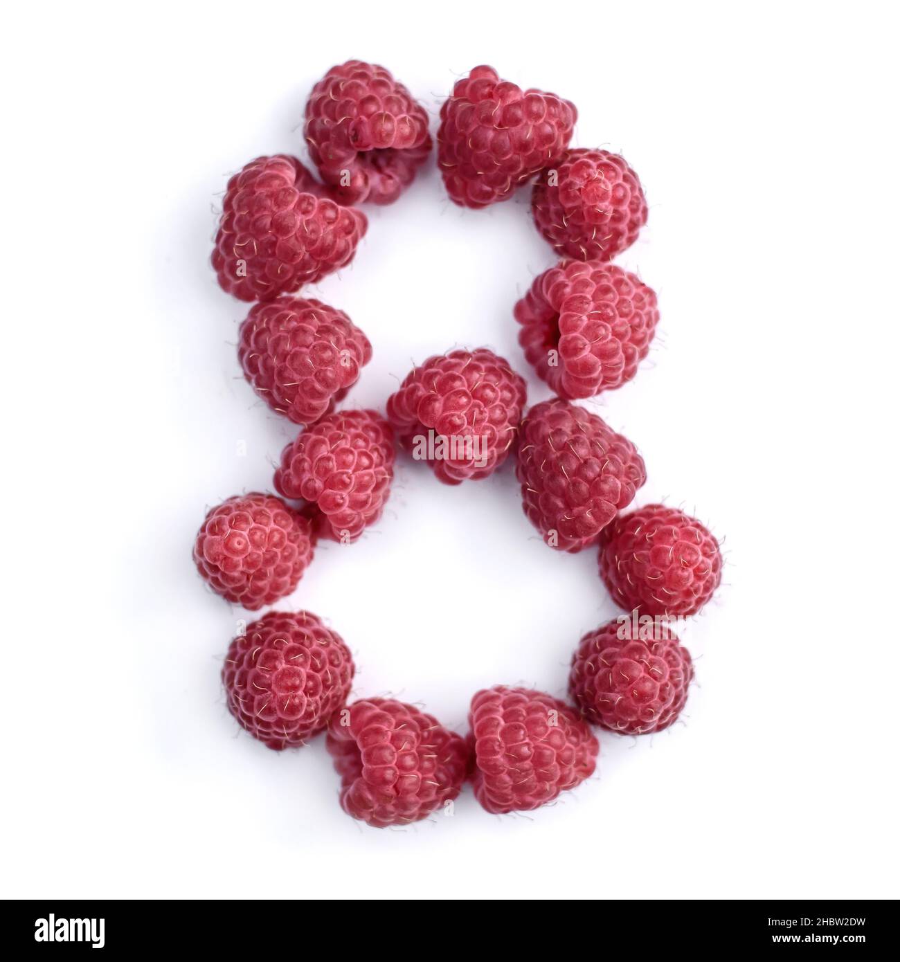 Number 8 of red delicious ripe raspberries, isolate on a white ...