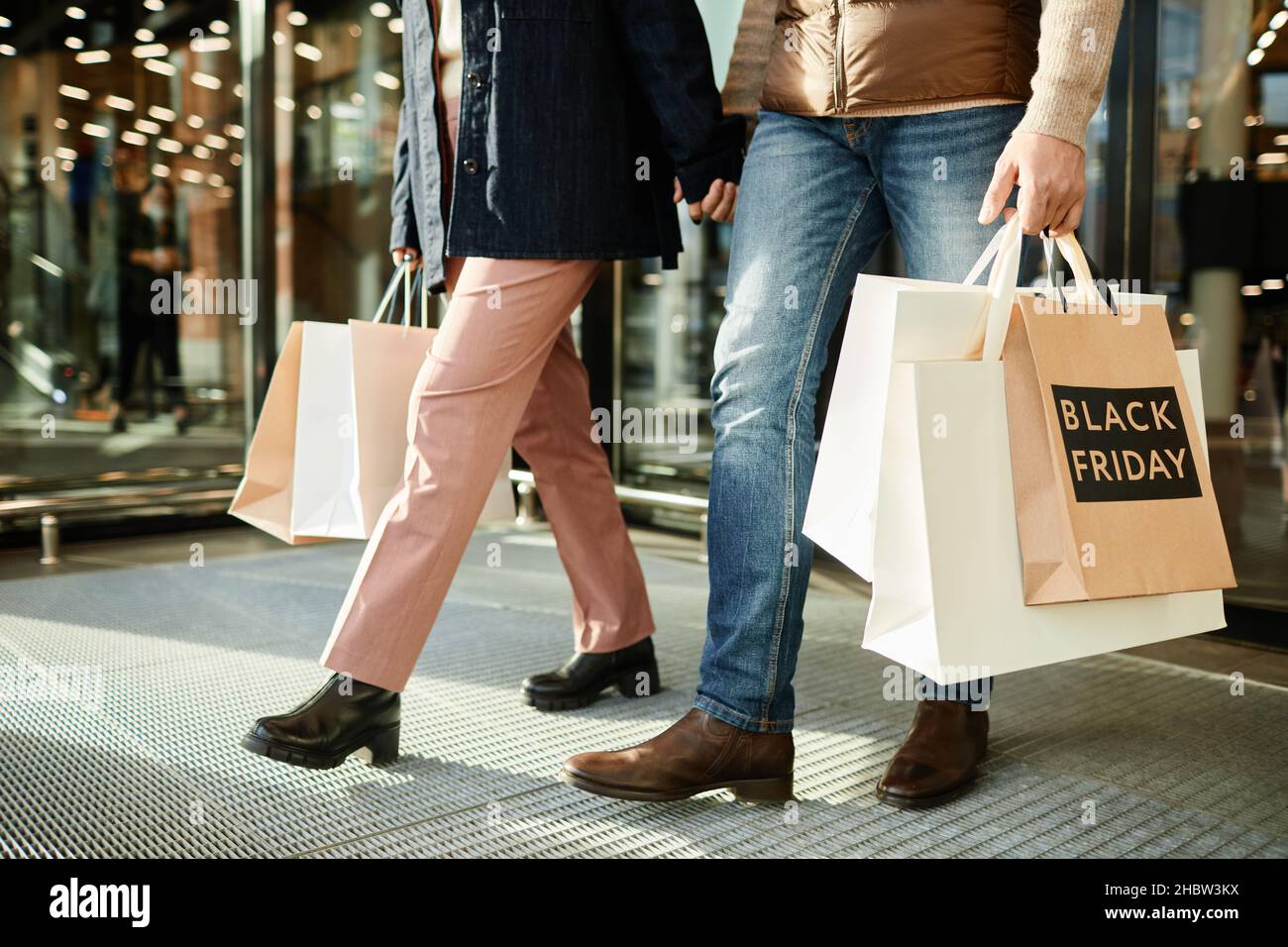 Man leaving store shopping bags hi-res stock photography and images - Alamy