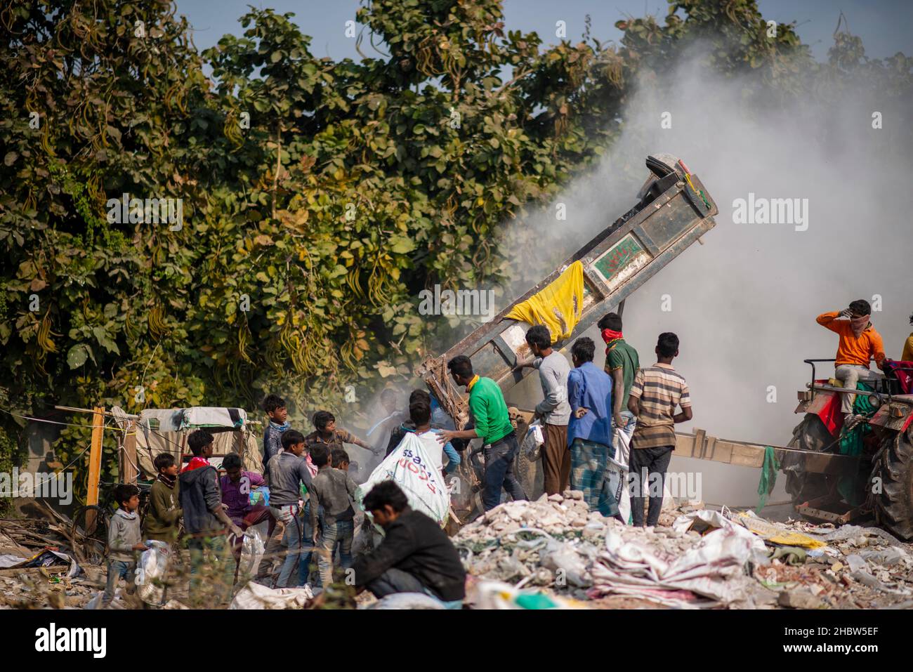 Gurugram, India. 21st Dec, 2021. A tractor trolley seen dumping garbage ...