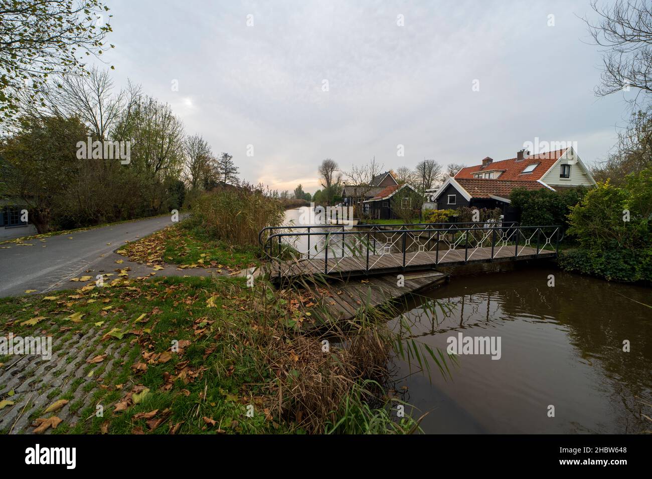 The Oude Waver river flowing through the hamlet of Waver Stock Photo ...