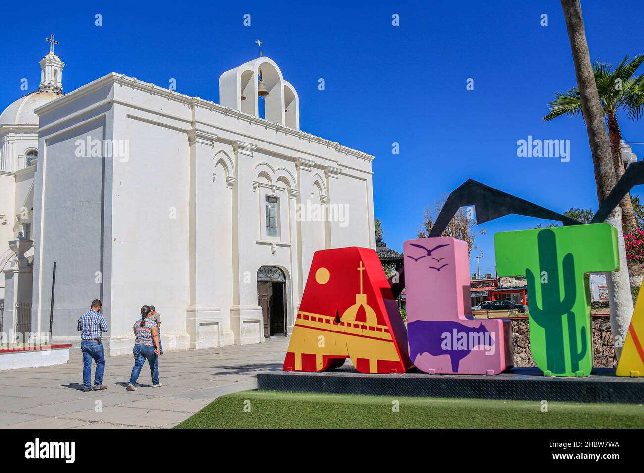 Monumetal colored letters with the legend ALTAR and temple or parish of ...