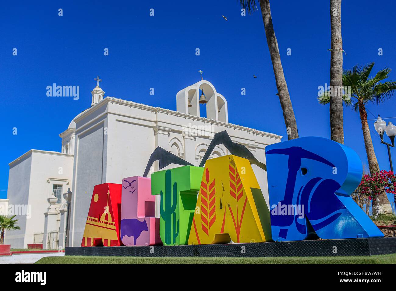 Monumetal colored letters with the legend ALTAR and temple or parish of ...