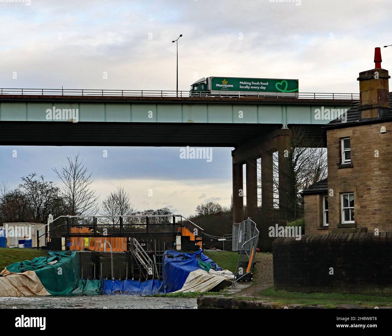 A Morrison’s lorry high up on the M6 viaduct crosses maintaince works ...