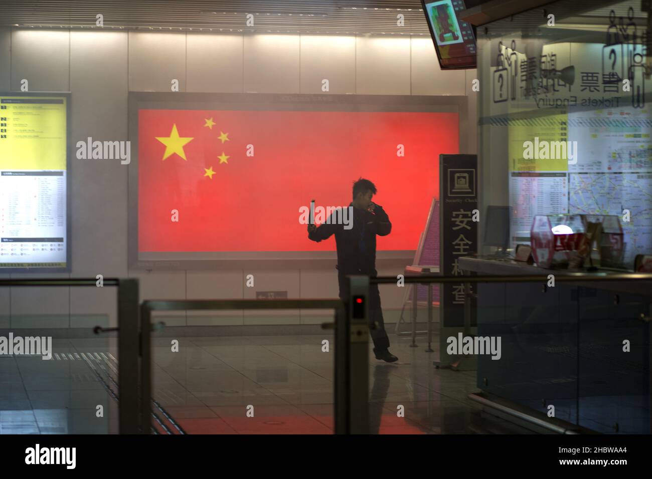 Security guard with what appears to be a gun during an incident inside ...