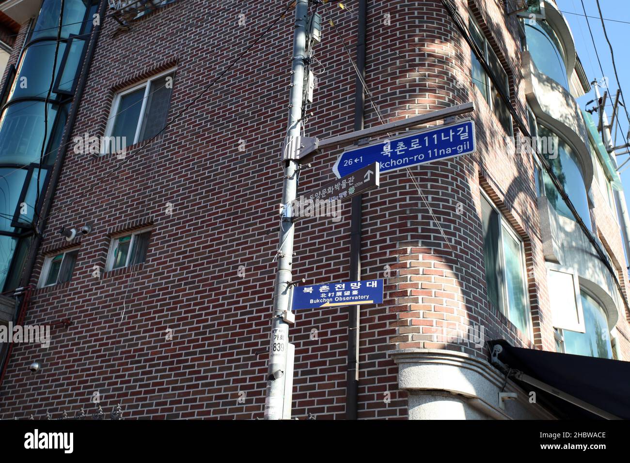 Street name sign for Bukchon-ro, Bukchon Observatory and the Asian Art ...