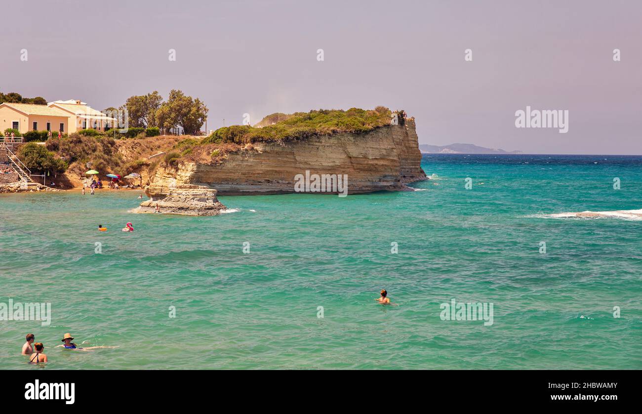 Sidari, Corfu, Greece - August 01, 2021: People relax on the beach at ...