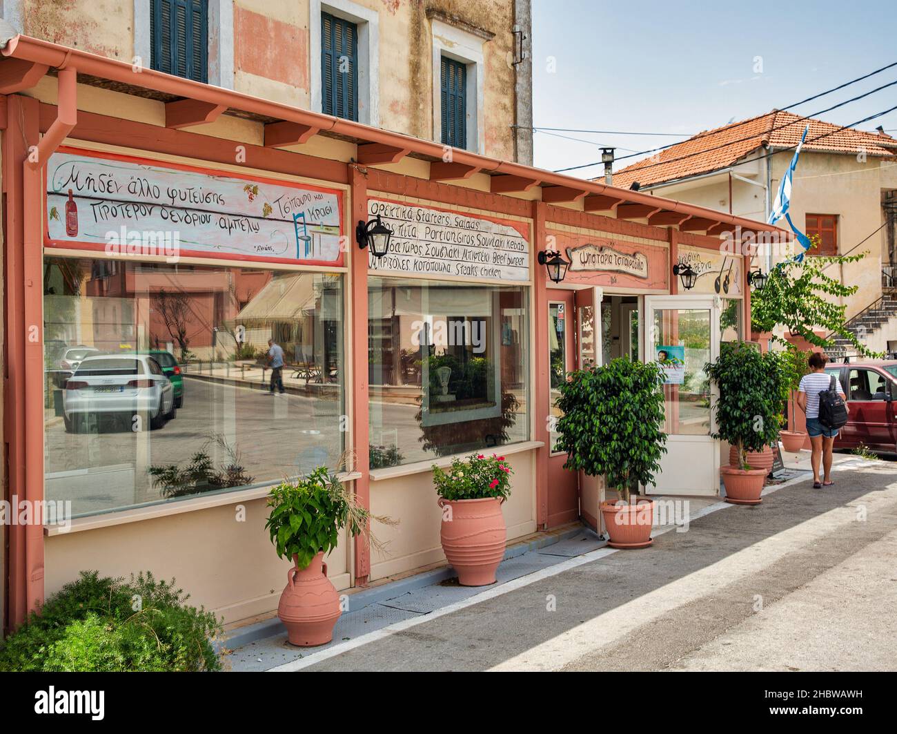 Leflimmi, Corfu, Greece - August 05, 2021: Rural taverna facade with ...