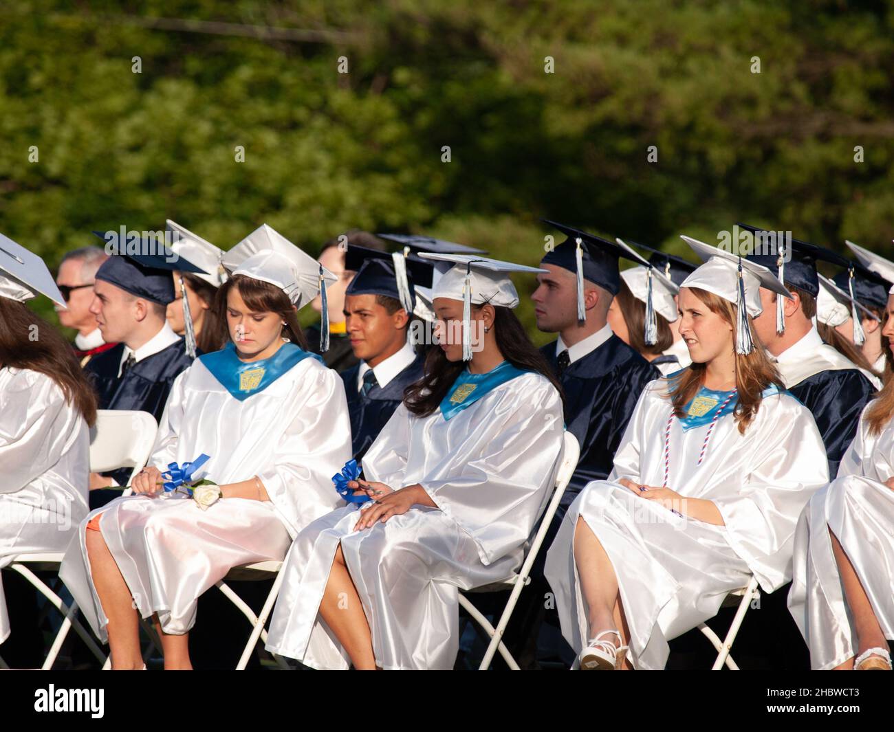 High School Graduates seated in ceremony Stock Photo - Alamy