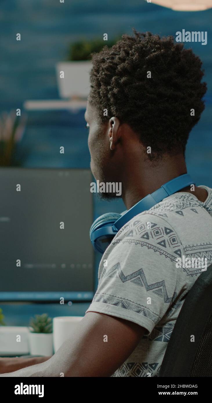 Person programming website firewall with codes on computer. Programmer ...