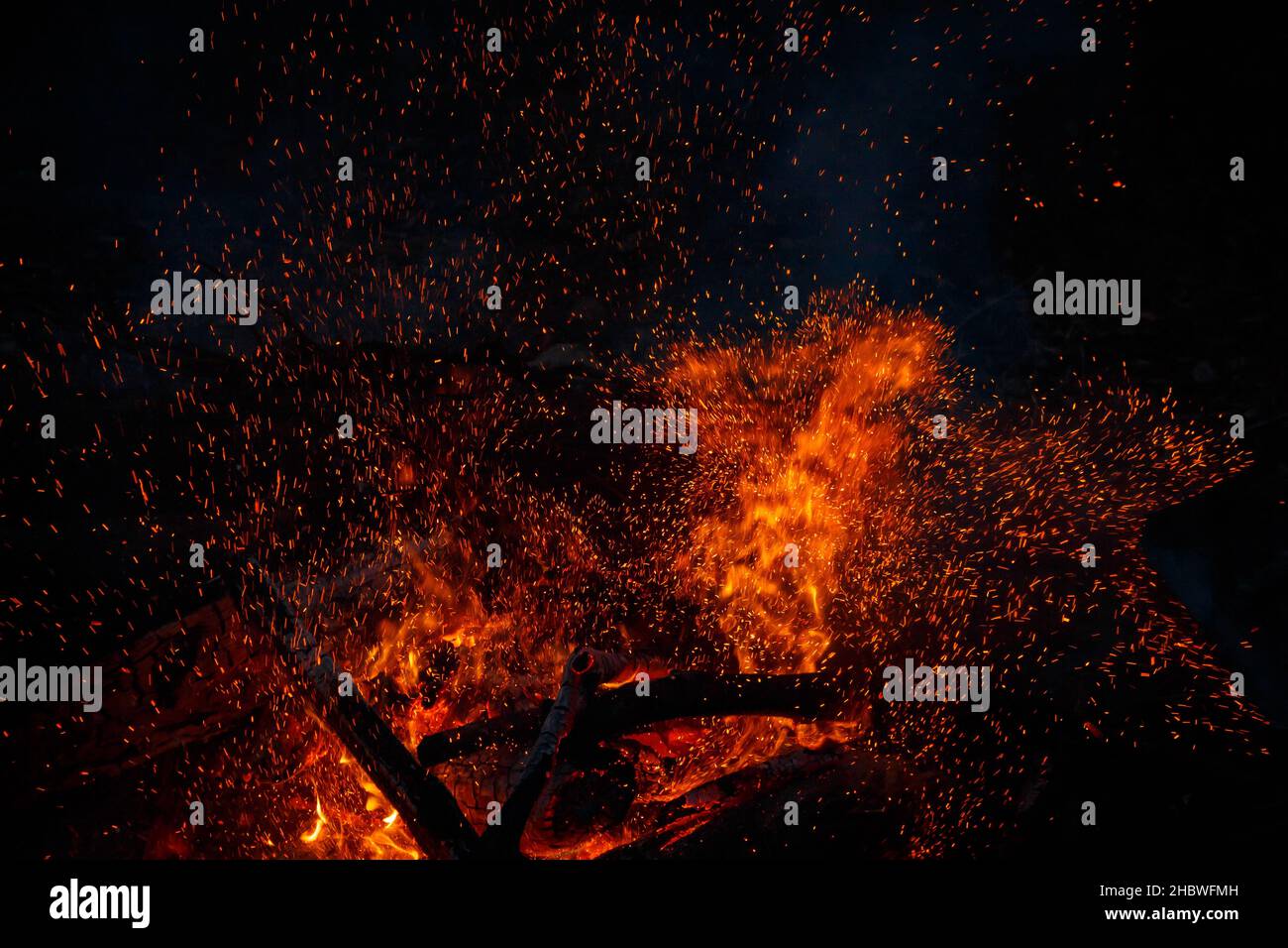 Big bonfire with sparks flying up, colorful space effect Stock Photo ...