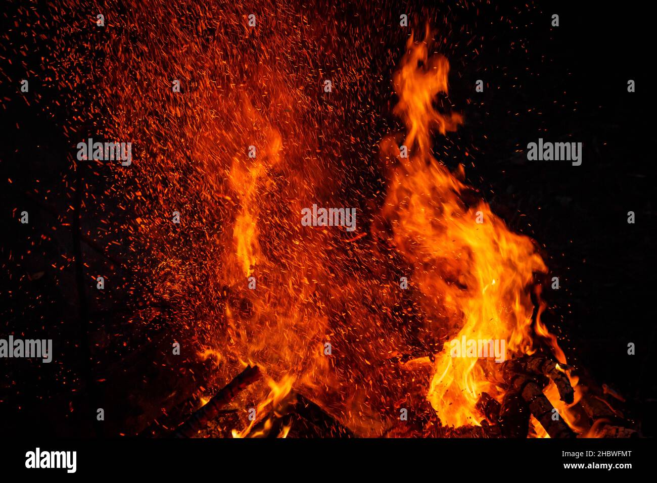 Big bonfire with sparks flying up, colorful space effect Stock Photo ...