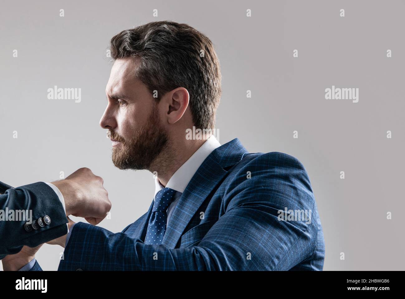 Professional employee man got in physical fight grey background ...
