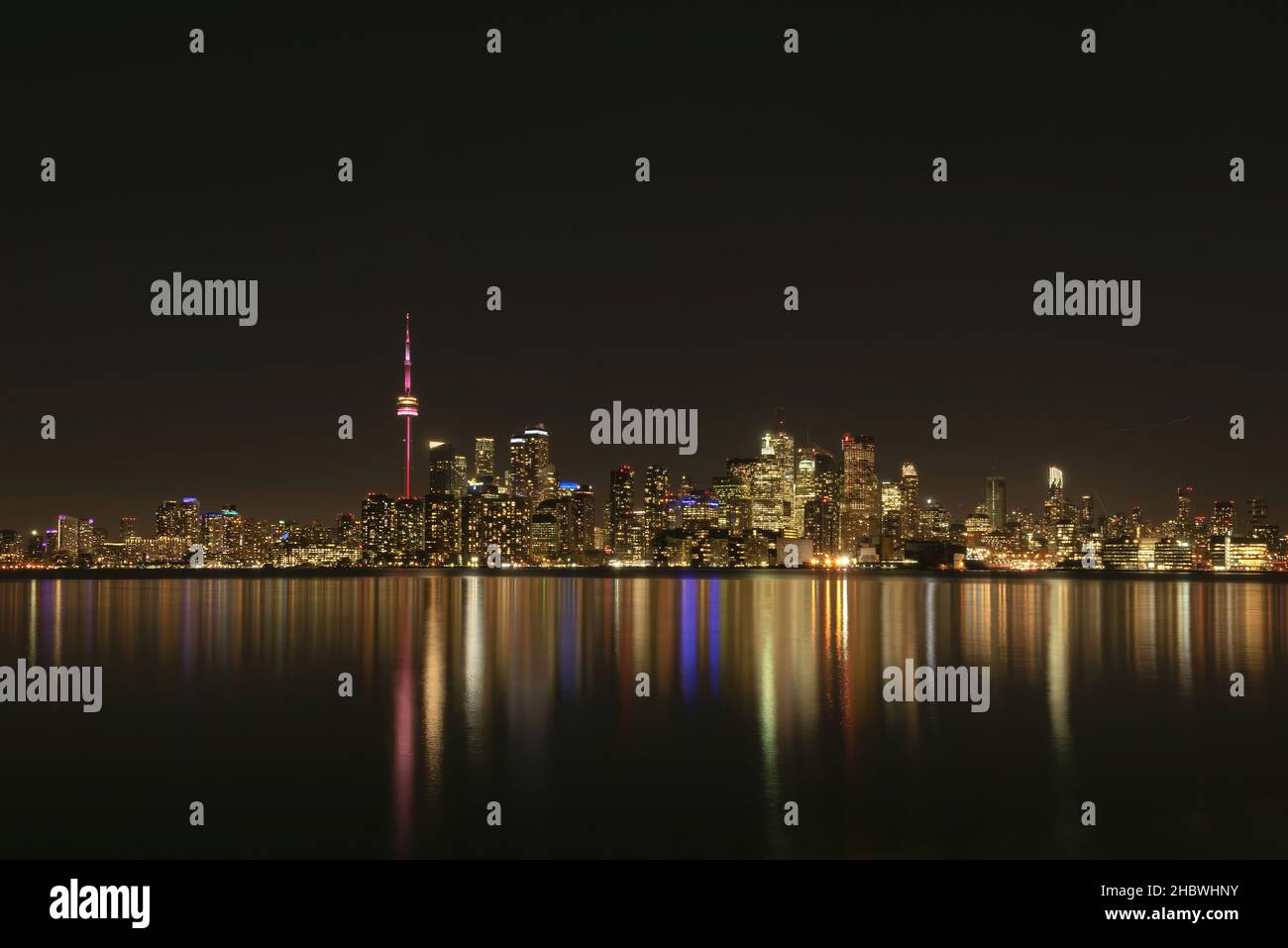 The Skyline of Toronto (ON) Canada at night with reflections on the ...