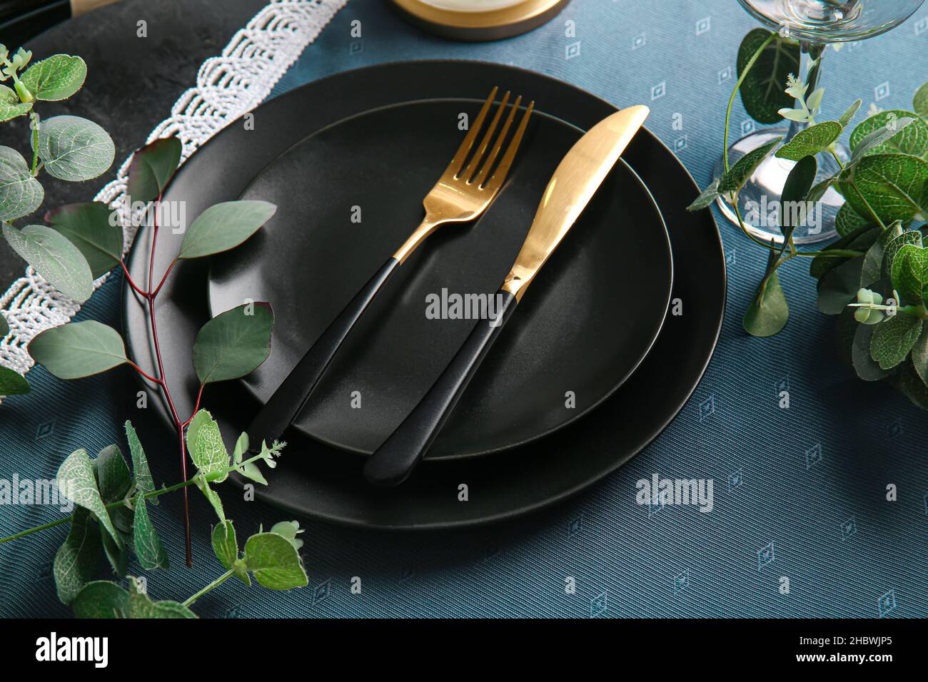 Beautiful table setting for wedding on black background Stock Photo - Alamy