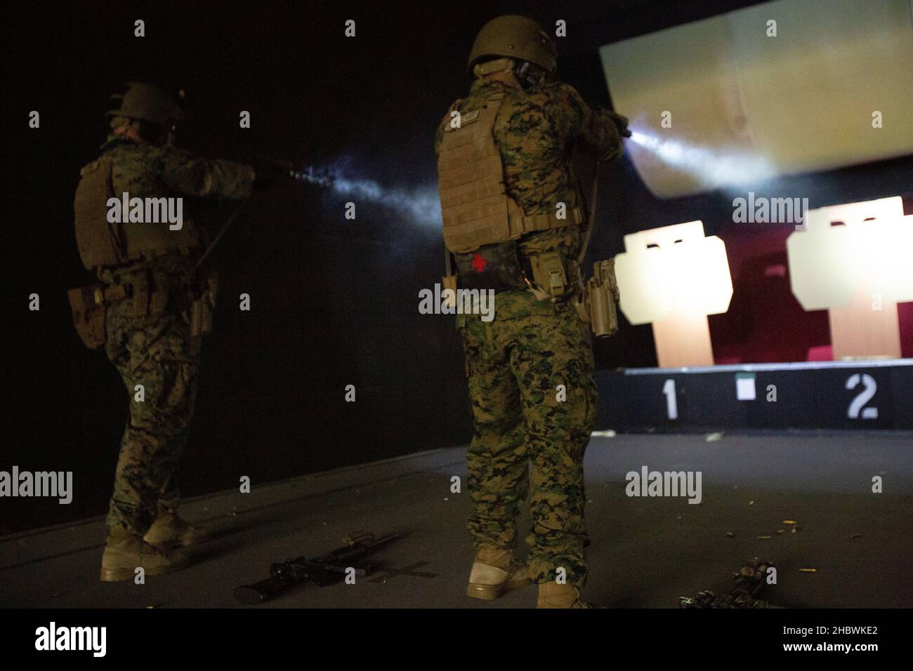 U.S. Marine Corps Sgt. Wil Raymond, left, and Sgt. Brayam Ceballos ...