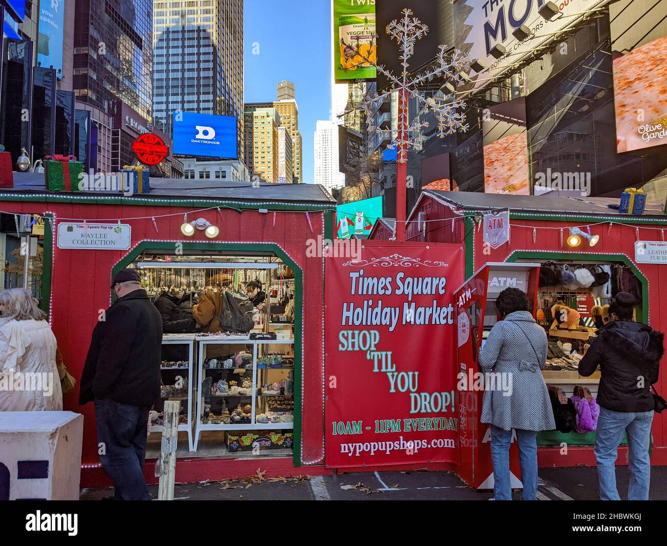 Holiday market stalls are being built at Times Square in New York City ...