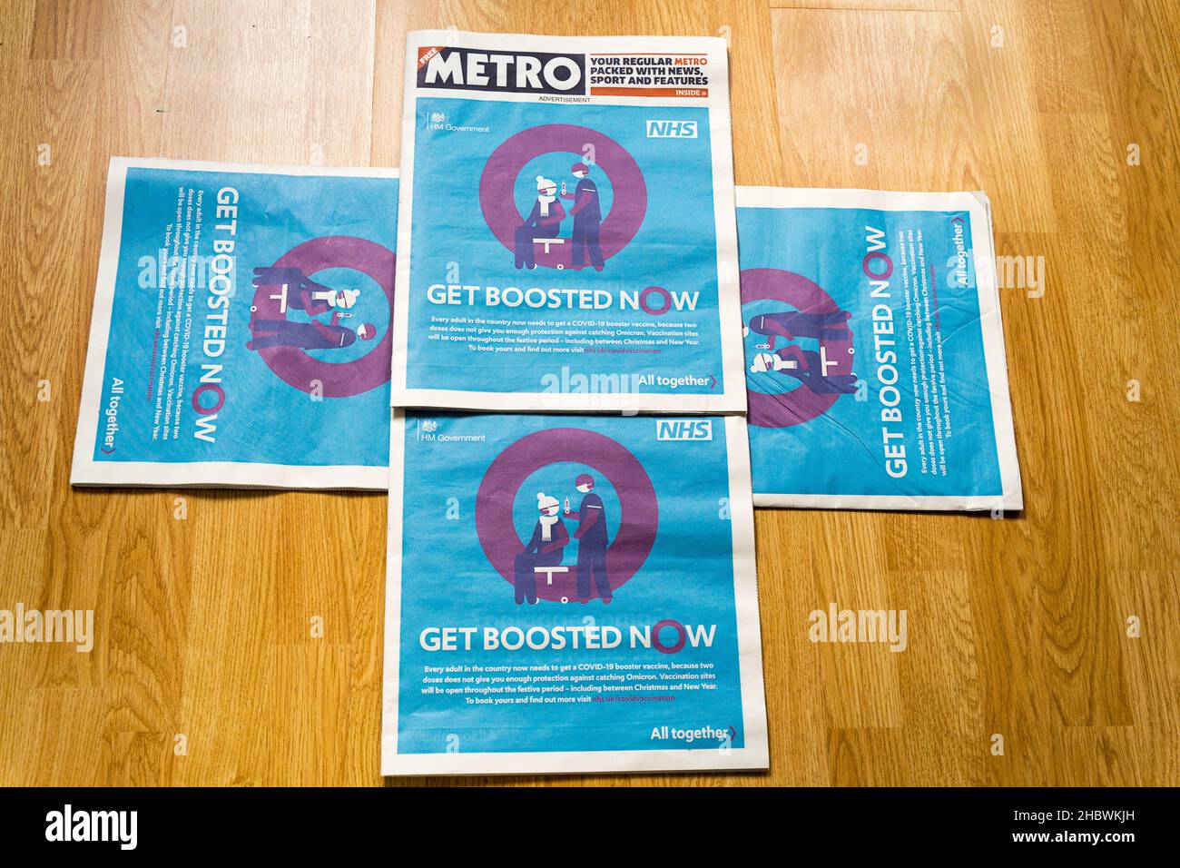 four of same Advertisements form a blue cross display NHS message "Get ...